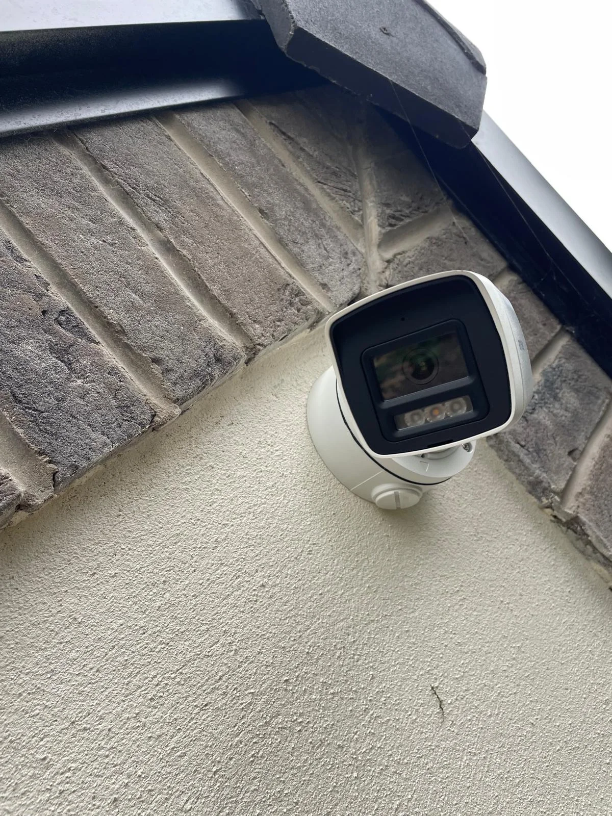 Dome CCTV camera installed under soffit